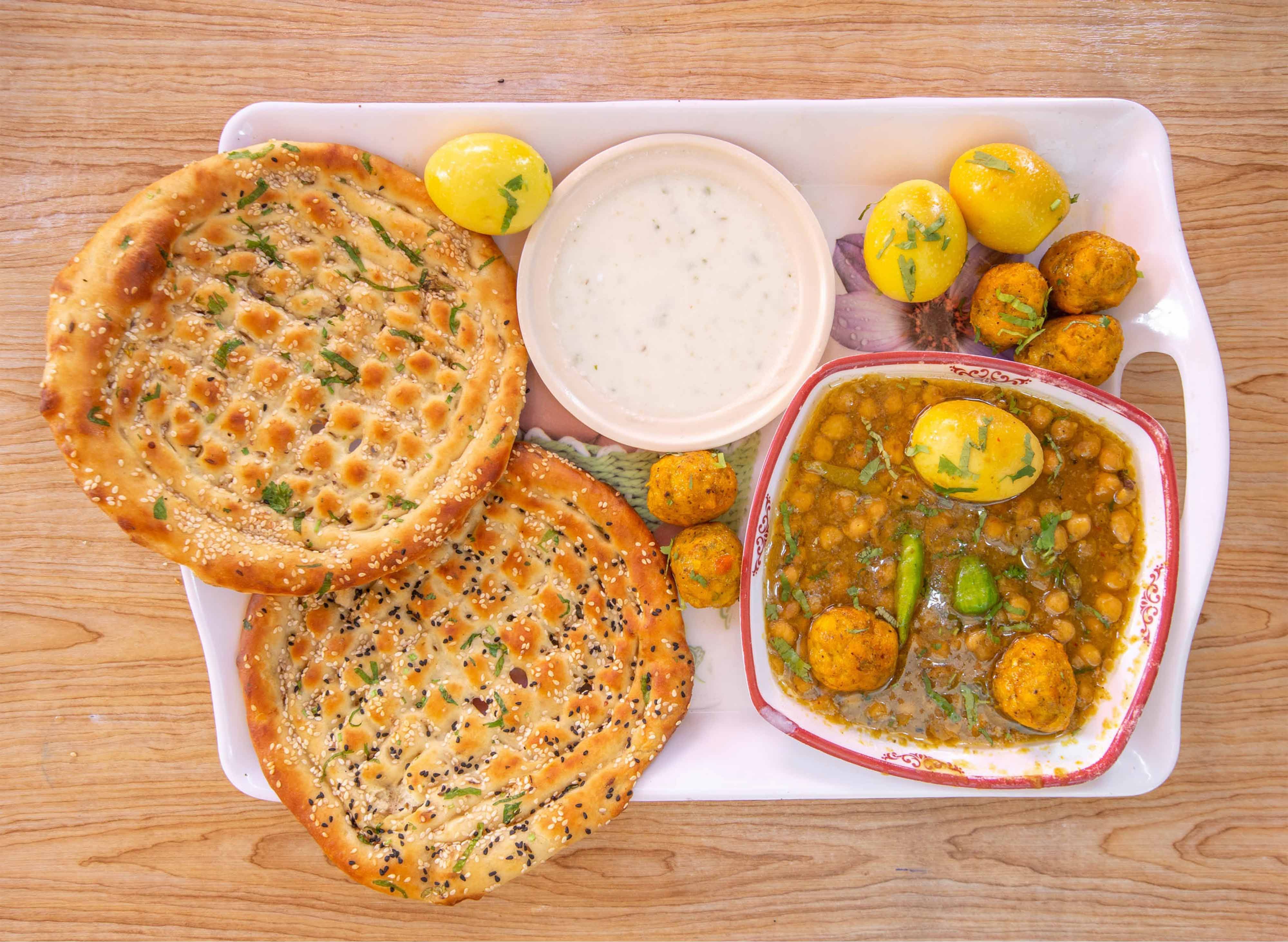 Dhaka Roghni Naan & Lahori Chanay menu in Multan | Food Delivery Multan ...