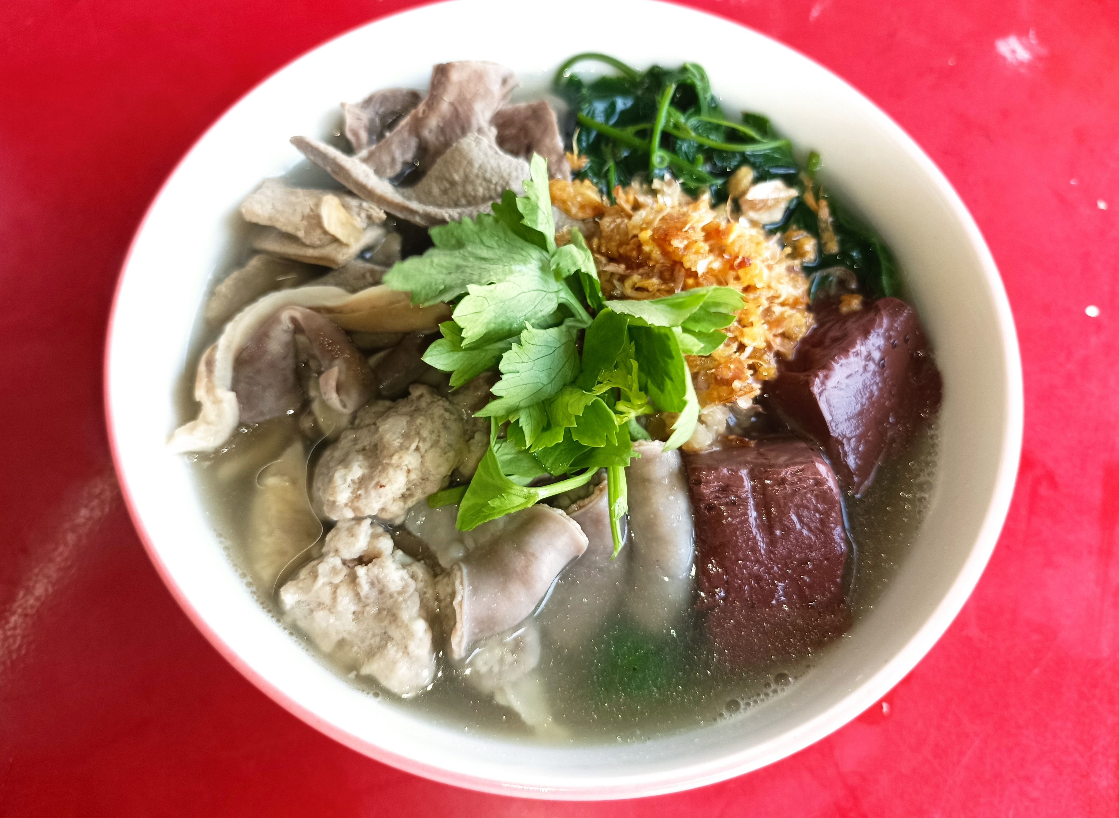 Jae June Tom Luad Moo Khao Niew Moo Kai Thod delivery near you in ...