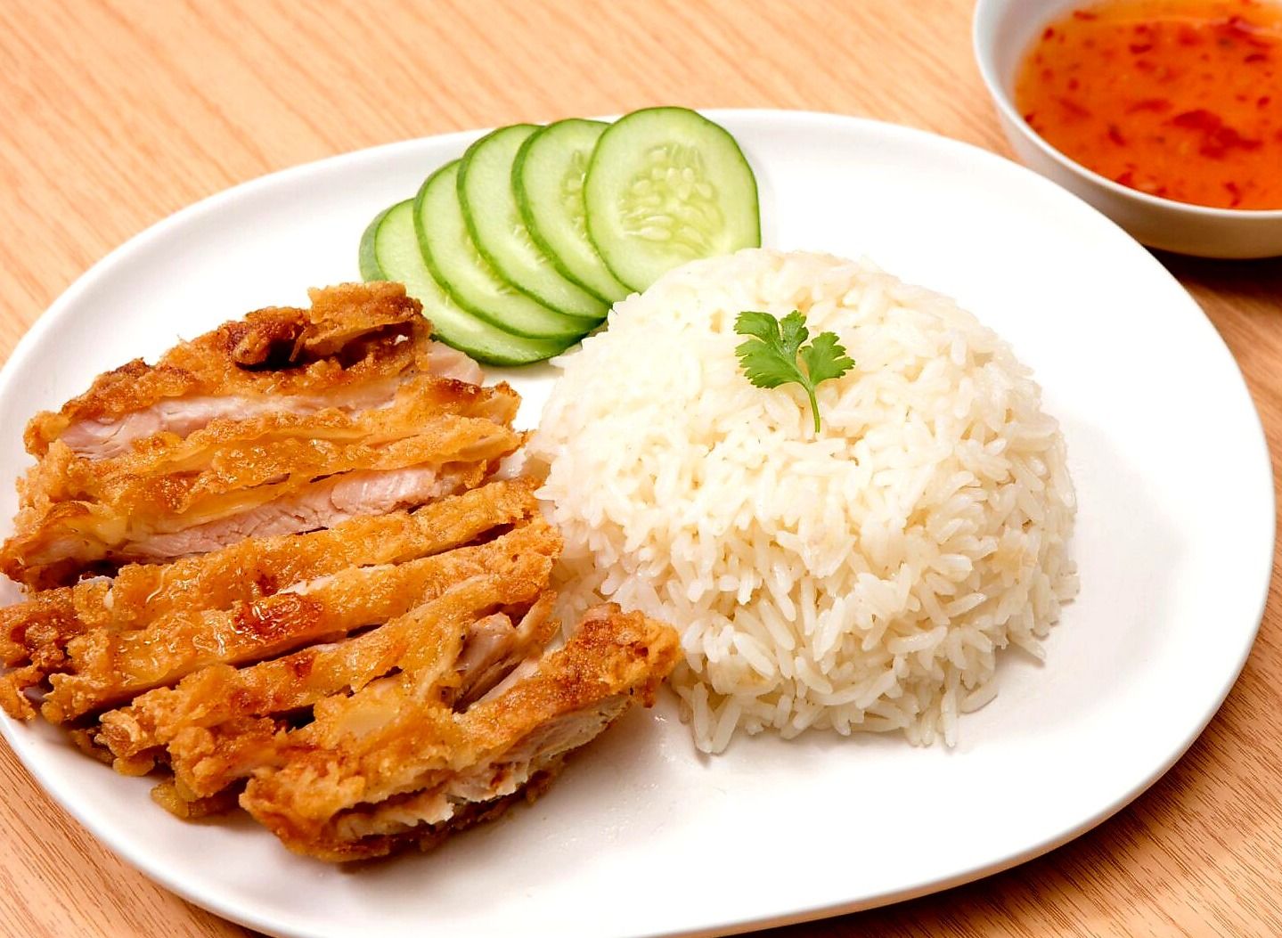 สั่งข้าวมันหมูทอดและข้าวเหนียวหมูทอดใกล้บ้านคุณในChiang Rai | foodpanda