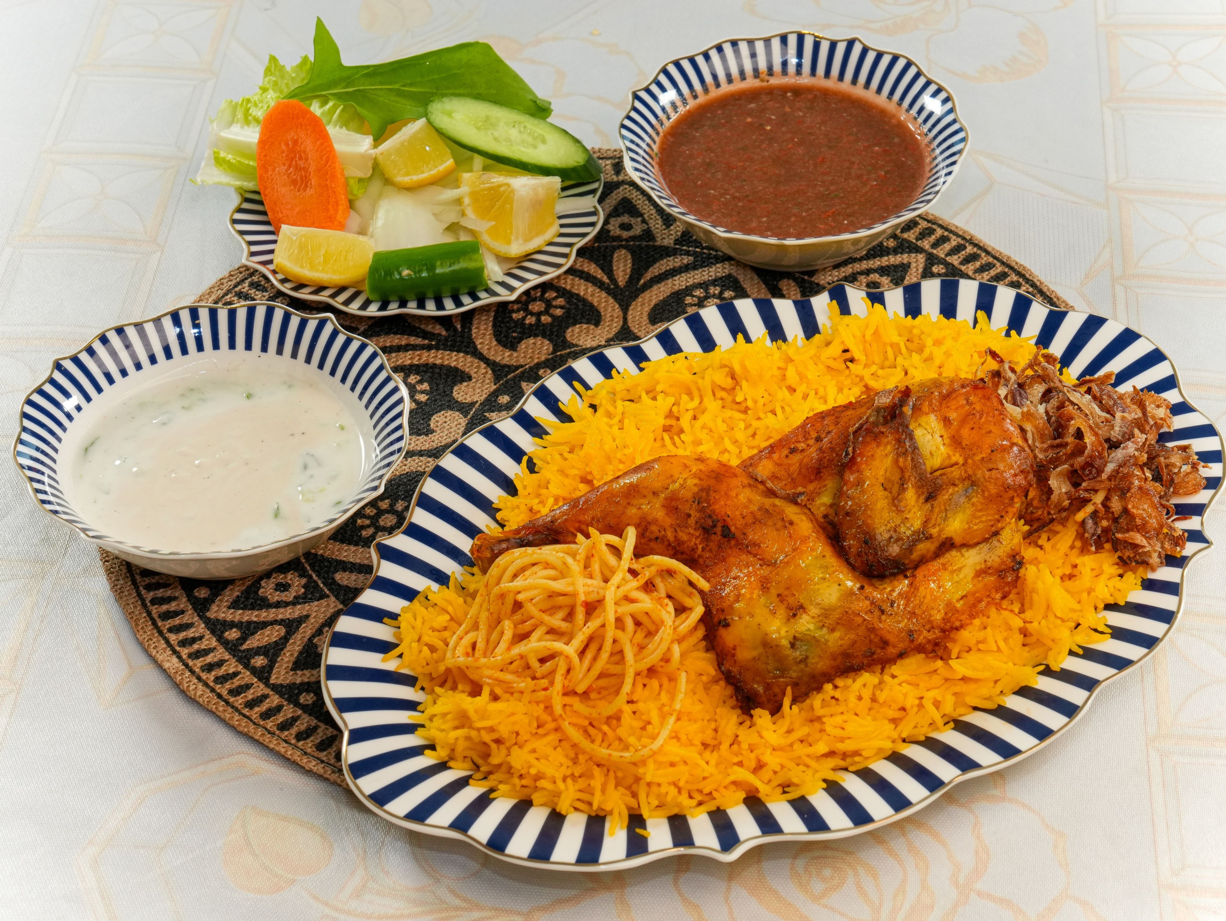 Bab Al Fkamah For Mandi & Al Madbi Restaurant delivery service in UAE ...