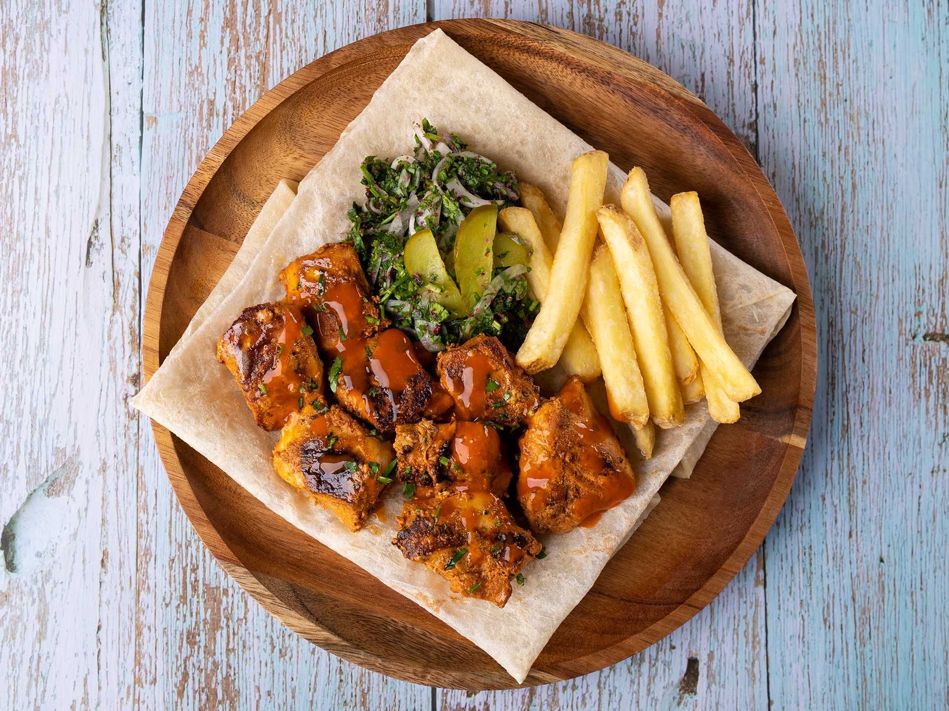 Tawook Workshop delivery service in Qatar | Talabat