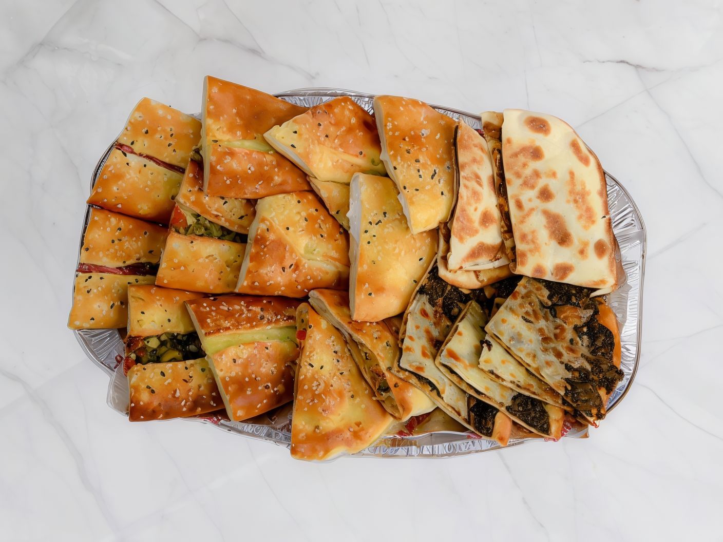 Fatayer Amo Mshaltit delivery service in Kuwait | Talabat