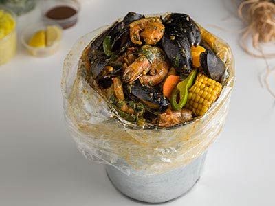 Crab Pot Seafood Restaurant delivery in Doha, Duhail and many other ...