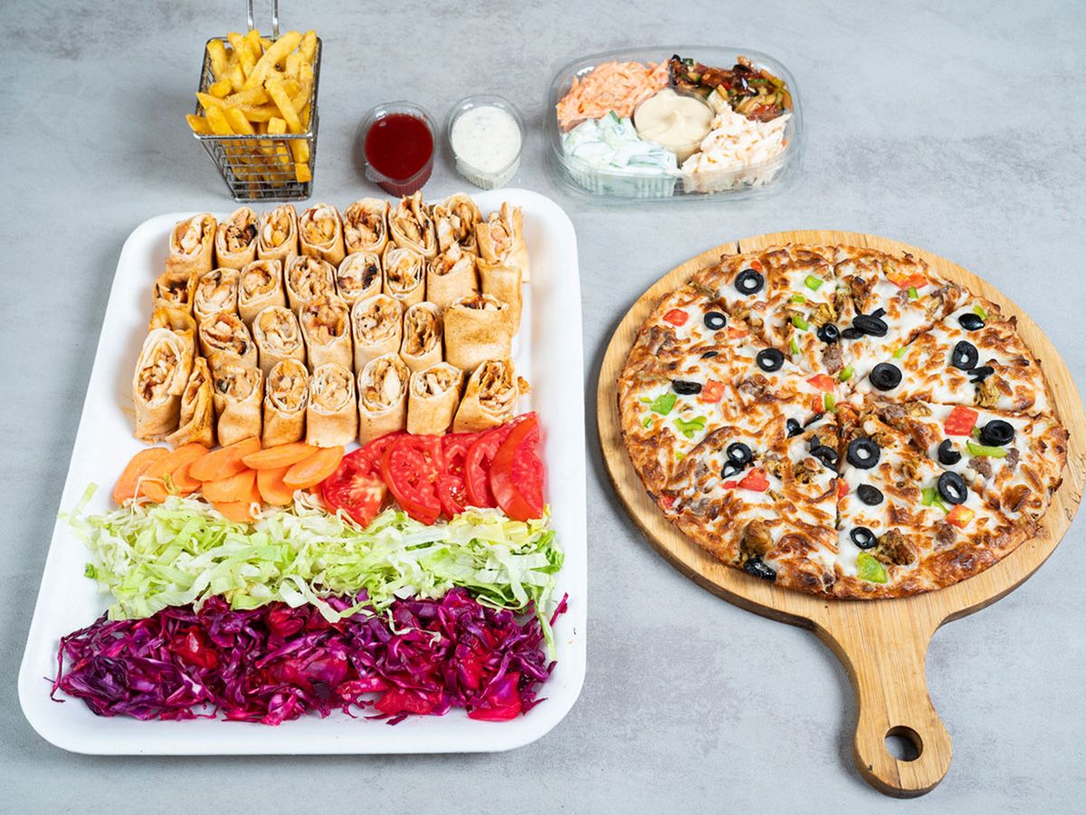 توصيل بيتزا نازيا سريع في العراق | طلبات