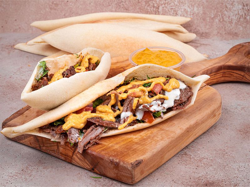 Shawarma Adam delivery service in Kuwait | Talabat