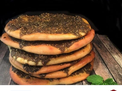 Pizza W Moajanat Alfaroq delivery service in Jordan | Talabat