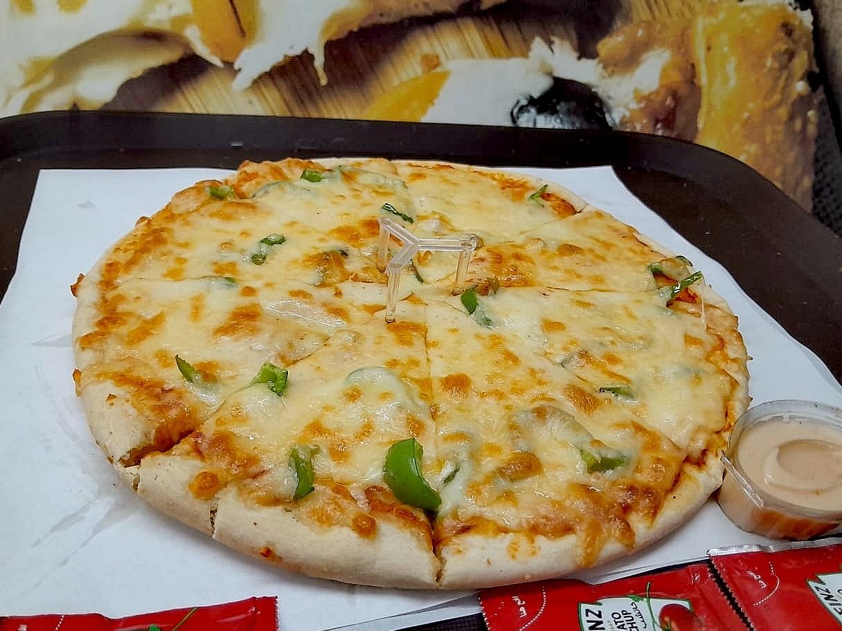 Pizza Carrozza delivery service in Egypt | Talabat