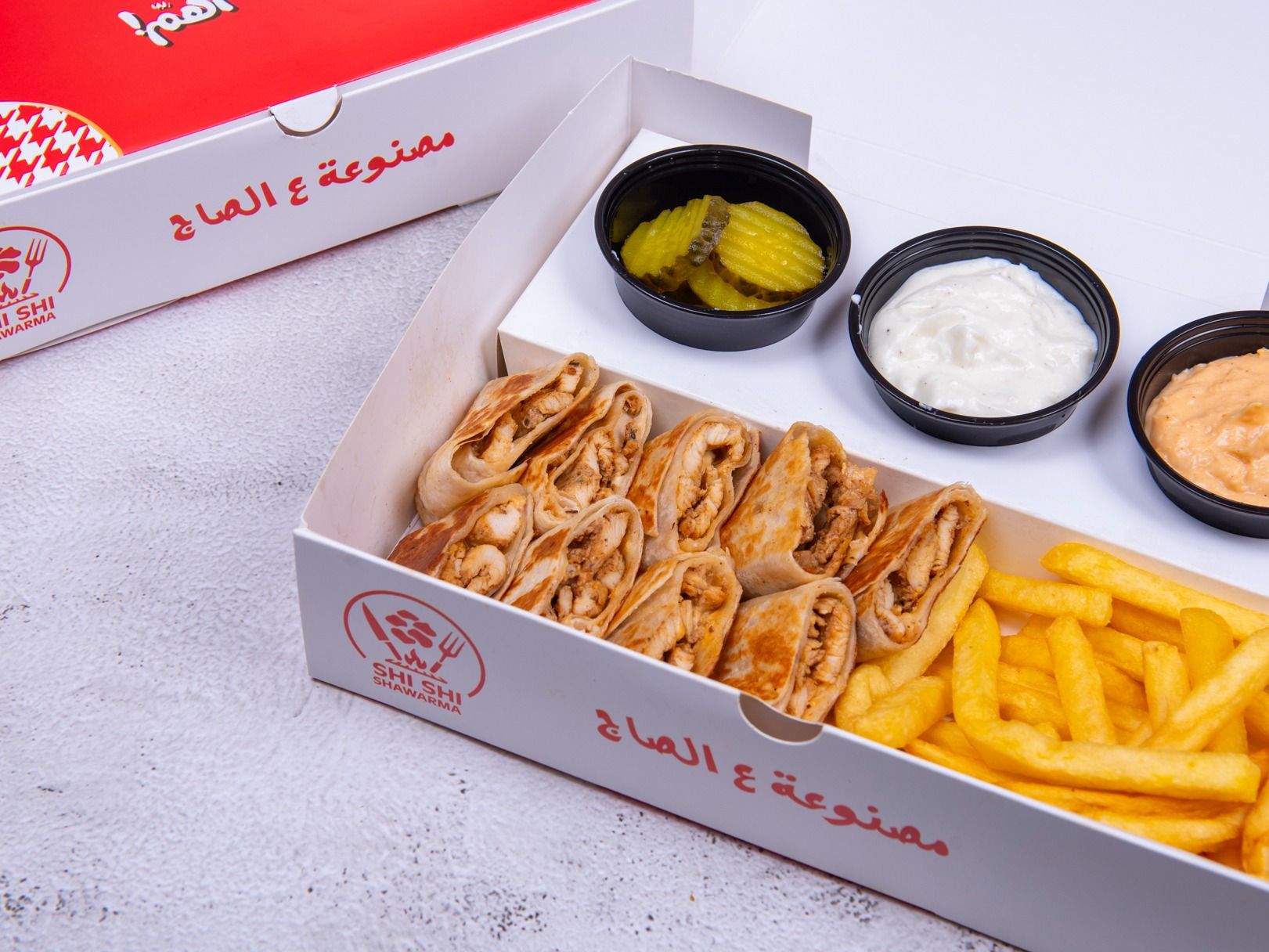 Shi Shi Shawarma & Burger Grill delivery service in UAE | Talabat