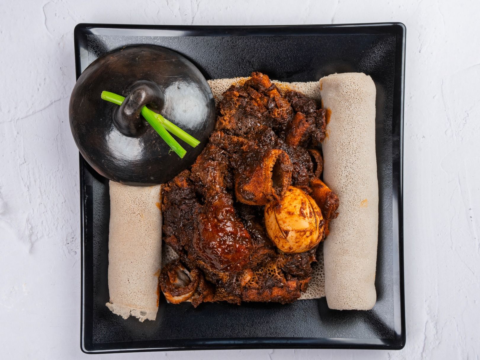 Enjera Ethiopian Restaurant delivery service in UAE | Talabat
