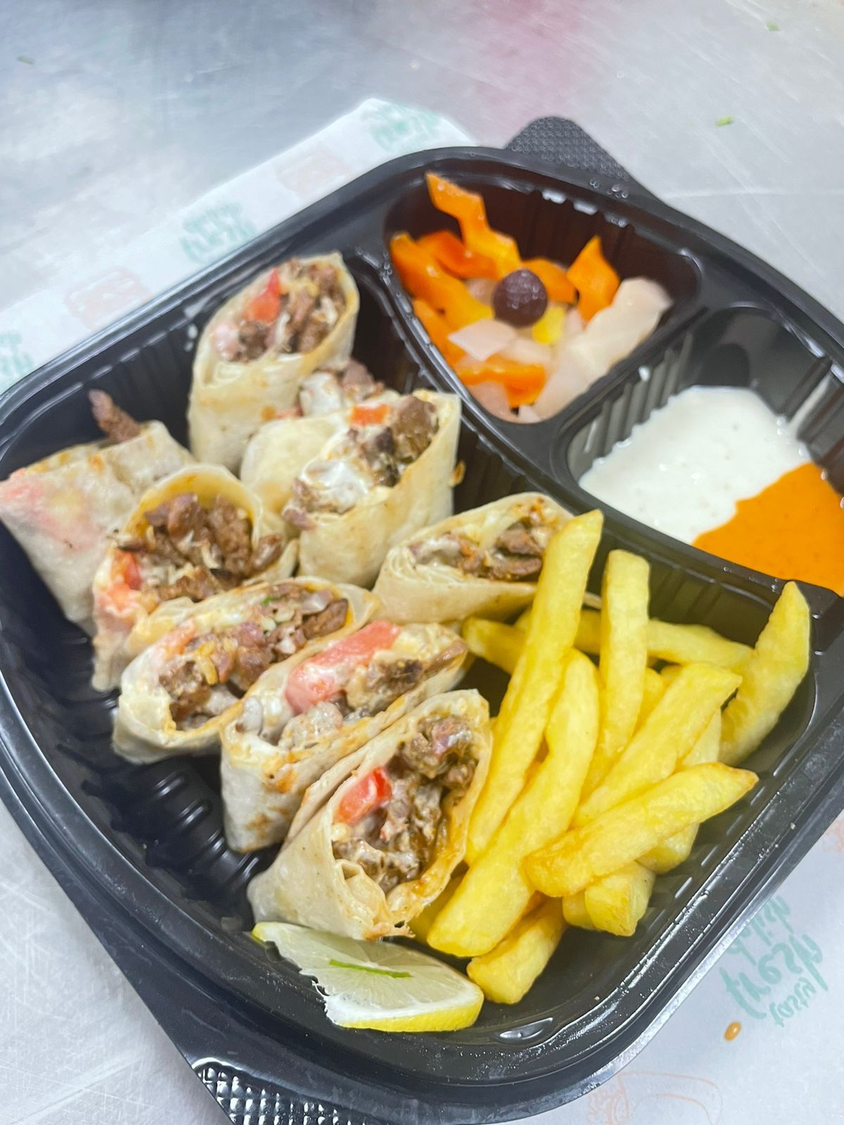 Burger and Meshkak Ubo Gaith delivery service in Oman | Talabat